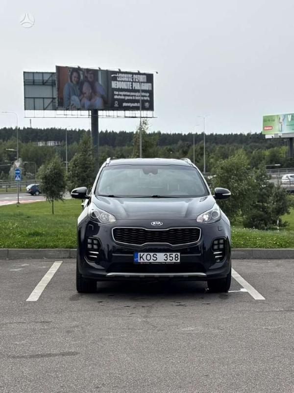Black Kia Sportage 2018 in Vilnius, with an engine capacity of 1.59 L and mileage of 76 thousand km for 15900 €, photo 3 on AUTOMOTO.COM.LV