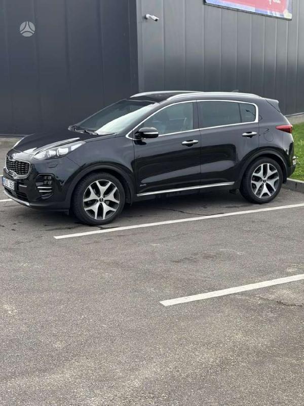 Black Kia Sportage 2018 in Vilnius, with an engine capacity of 1.59 L and mileage of 76 thousand km for 15900 €, photo 4 on AUTOMOTO.COM.LV