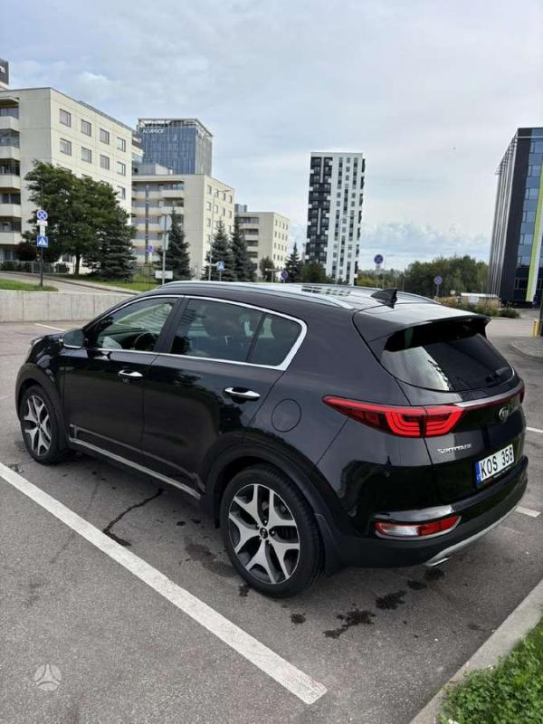 Black Kia Sportage 2018 in Vilnius, with an engine capacity of 1.59 L and mileage of 76 thousand km for 15900 €, photo 6 on AUTOMOTO.COM.LV