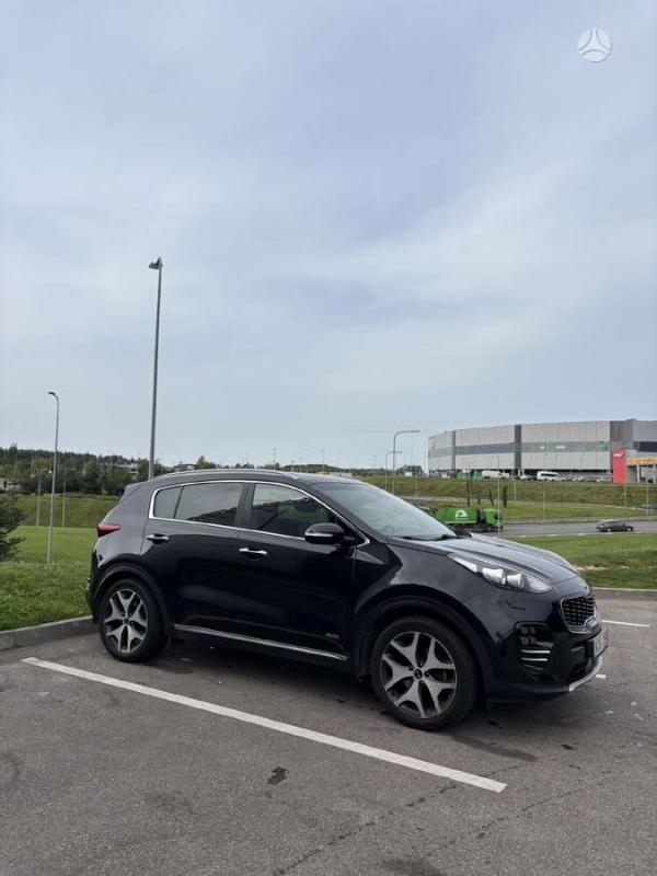 Black Kia Sportage 2018 in Vilnius, with an engine capacity of 1.59 L and mileage of 76 thousand km for 15900 €, photo 7 on AUTOMOTO.COM.LV