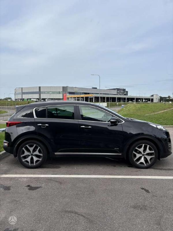 Black Kia Sportage 2018 in Vilnius, with an engine capacity of 1.59 L and mileage of 76 thousand km for 15900 €, photo 8 on AUTOMOTO.COM.LV
