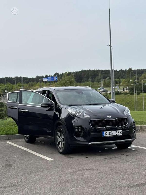 Black Kia Sportage 2018 in Vilnius, with an engine capacity of 1.59 L and mileage of 76 thousand km for 15900 €, photo 10 on AUTOMOTO.COM.LV