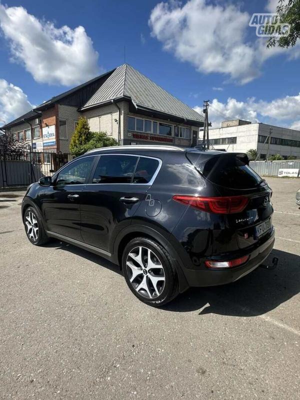 Black Kia Sportage 2018 in Kaunas, with an engine capacity of 1.70 L and mileage of 156 thousand km for 12800 €, photo 7 on AUTOMOTO.COM.LV
