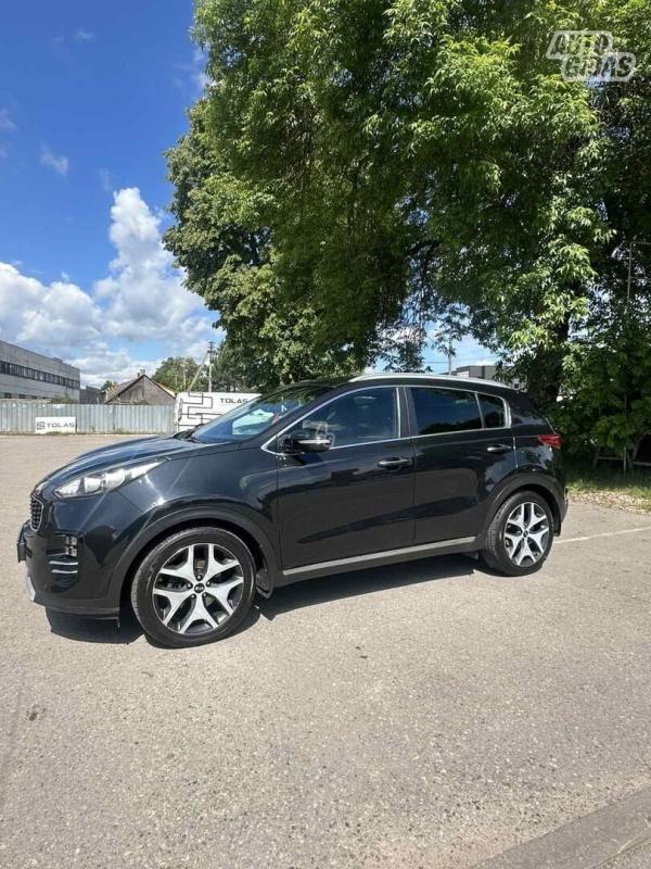Black Kia Sportage 2018 in Kaunas, with an engine capacity of 1.70 L and mileage of 156 thousand km for 12800 €, photo 9 on AUTOMOTO.COM.LV