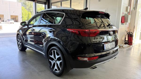 Black Kia Sportage 2018 in Riga, with an engine capacity of 1.60 L and mileage of 82 thousand km for 13900 €, photo 2 on AUTOMOTO.COM.LV