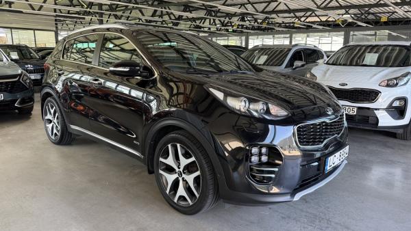 Black Kia Sportage 2018 in Riga, with an engine capacity of 1.60 L and mileage of 82 thousand km for 13900 €, photo 5 on AUTOMOTO.COM.LV