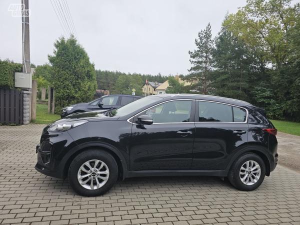 Black Kia Sportage 2018 in Ukmerge, with an engine capacity of 1.60 L and mileage of 226 thousand km for 9700 €, photo 6 on AUTOMOTO.COM.LV