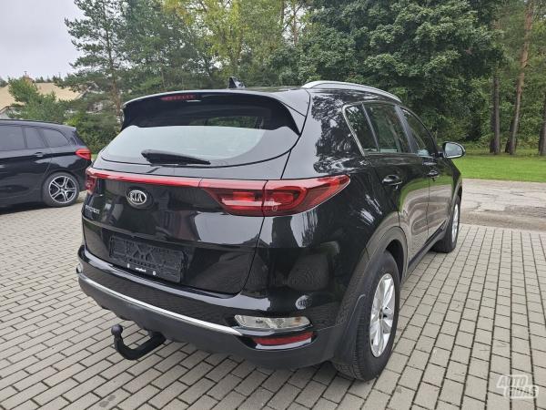 Black Kia Sportage 2018 in Ukmerge, with an engine capacity of 1.60 L and mileage of 226 thousand km for 9700 €, photo 10 on AUTOMOTO.COM.LV