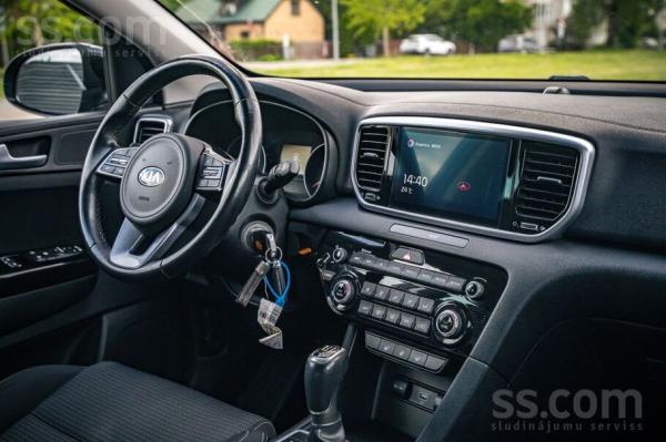 Black Kia Sportage 2020 in Riga, with an engine capacity of 1.60 L and mileage of 0 thousand km for 13990 €, photo 7 on AUTOMOTO.COM.LV