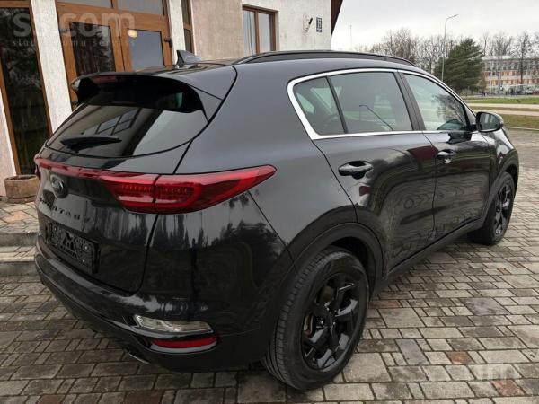 Black Kia Sportage 2021 in Jelgava, with an engine capacity of 1.60 L and mileage of 178 thousand km for 15700 €, photo 3 on AUTOMOTO.COM.LV
