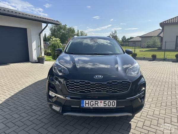 Black Kia Sportage 2021 in Vilnius, with an engine capacity of 1.60 L and mileage of 128 thousand km for 18500 €, photo 1 on AUTOMOTO.COM.LV