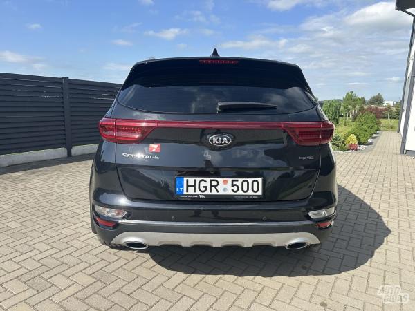 Black Kia Sportage 2021 in Vilnius, with an engine capacity of 1.60 L and mileage of 128 thousand km for 18500 €, photo 2 on AUTOMOTO.COM.LV