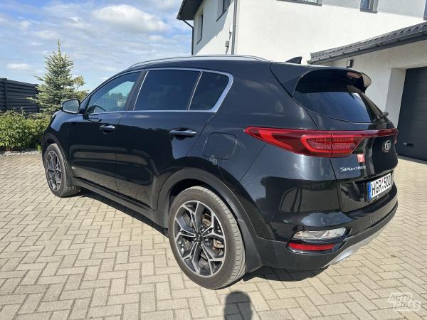 Black Kia Sportage 2021 in Vilnius, with an engine capacity of 1.60 L and mileage of 128 thousand km for 18500 €, photo 4 on AUTOMOTO.COM.LV