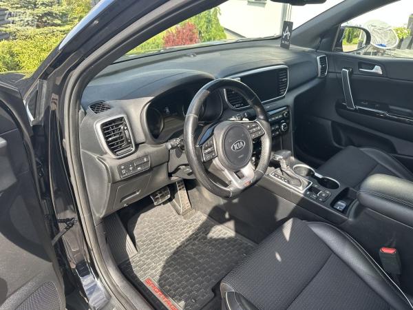 Black Kia Sportage 2021 in Vilnius, with an engine capacity of 1.60 L and mileage of 128 thousand km for 18500 €, photo 7 on AUTOMOTO.COM.LV