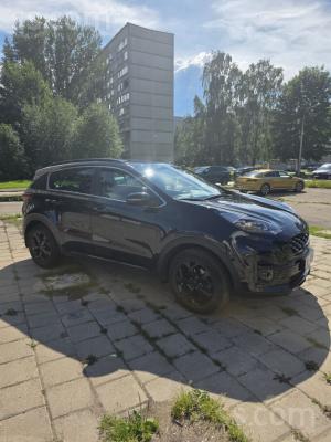 Black Kia Sportage 2021 in Riga, with an engine capacity of 1.60 L and mileage of 47 thousand km for 17700 €, photo  on AUTOMOTO.COM.LV