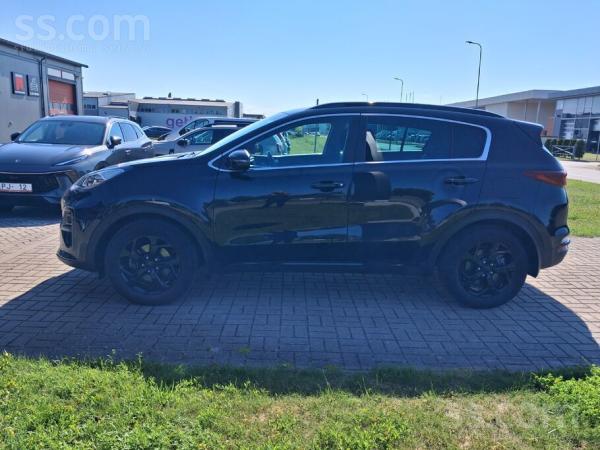 Black Kia Sportage 2021 in Liepaja, with an engine capacity of 1.60 L and mileage of 34 thousand km for 16640 €, photo 4 on AUTOMOTO.COM.LV