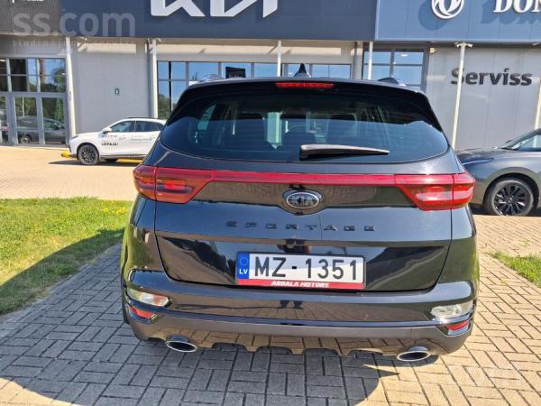 Black Kia Sportage 2021 in Liepaja, with an engine capacity of 1.60 L and mileage of 34 thousand km for 16640 €, photo 6 on AUTOMOTO.COM.LV
