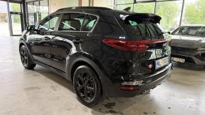 Black Kia Sportage 2021 in Riga, with an engine capacity of 1.60 L and mileage of 68 thousand km for 1790000 €, photo 3 on AUTOMOTO.COM.LV