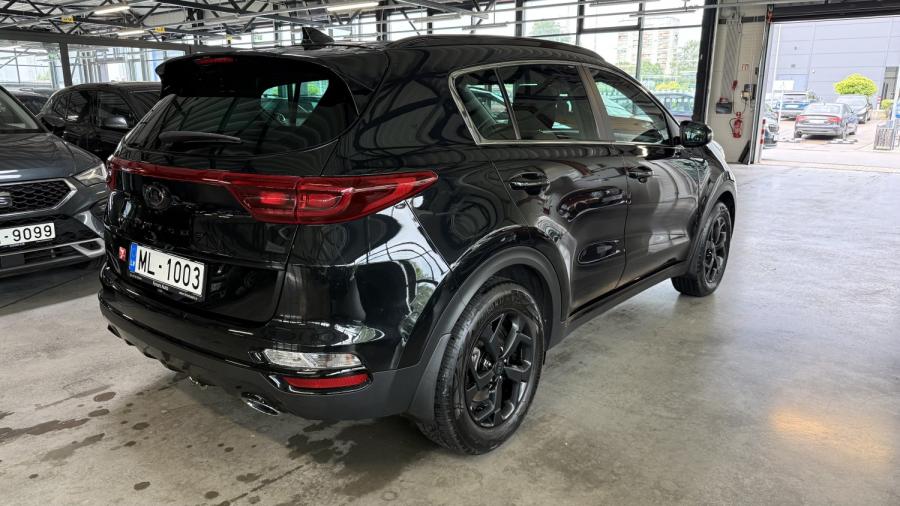 Black Kia Sportage 2021 in Riga, with an engine capacity of 1.60 L and mileage of 68 thousand km for 1790000 €, photo 4 on AUTOMOTO.COM.LV
