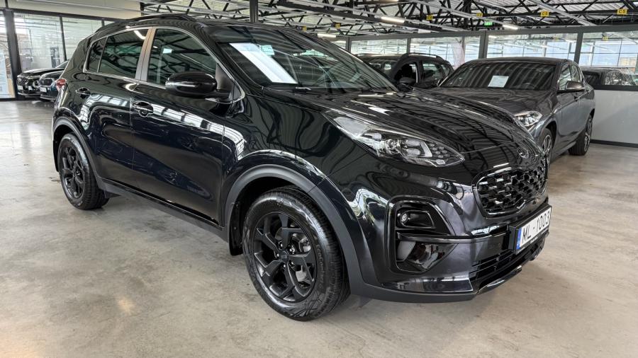 Black Kia Sportage 2021 in Riga, with an engine capacity of 1.60 L and mileage of 68 thousand km for 1790000 €, photo 6 on AUTOMOTO.COM.LV