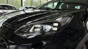 Black Kia Sportage 2021 in Riga, with an engine capacity of 1.60 L and mileage of 68 thousand km for 1790000 €, photo 8 on AUTOMOTO.COM.LV