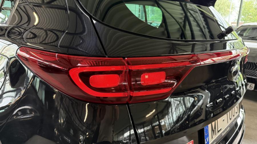 Black Kia Sportage 2021 in Riga, with an engine capacity of 1.60 L and mileage of 68 thousand km for 1790000 €, photo 9 on AUTOMOTO.COM.LV