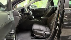 Black Kia Sportage 2021 in Riga, with an engine capacity of 1.60 L and mileage of 68 thousand km for 1790000 €, photo 10 on AUTOMOTO.COM.LV