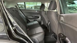 Black Kia Sportage 2021 in Riga, with an engine capacity of 1.60 L and mileage of 68 thousand km for 1790000 €, photo 14 on AUTOMOTO.COM.LV