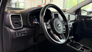 Black Kia Sportage 2021 in Riga, with an engine capacity of 1.60 L and mileage of 68 thousand km for 1790000 €, photo 17 on AUTOMOTO.COM.LV