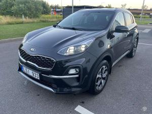 Black Kia Sportage 2021 in Vilnius, with an engine capacity of 1.59 L and mileage of 124 thousand km for 14700 €, photo  on AUTOMOTO.COM.LV