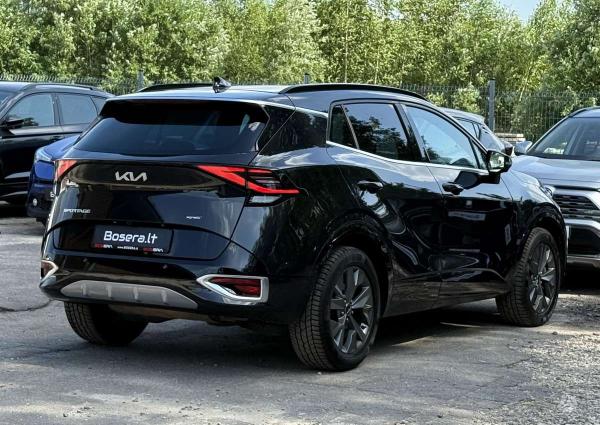 Black Kia Sportage 2022 in Vilnius, with an engine capacity of 1.60 L and mileage of 125 thousand km for 25990 €, photo 5 on AUTOMOTO.COM.LV