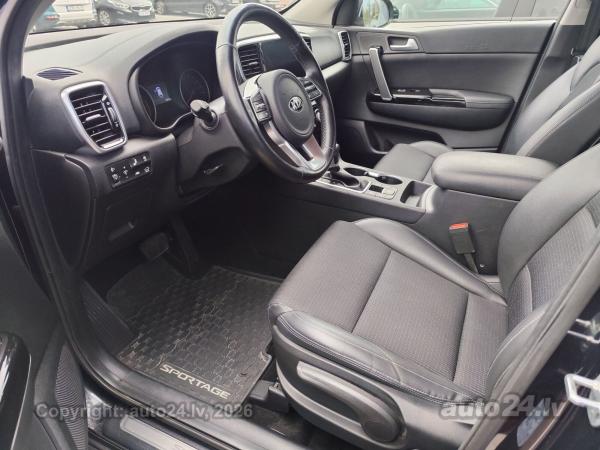 Black Kia Sportage 2022 in Tallinn, with an engine capacity of 1.60 L and mileage of 65 thousand km for 18500 €, photo 5 on AUTOMOTO.COM.LV