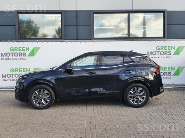 Black Kia Sportage 2022 in Riga, with an engine capacity of 1.60 L and mileage of 82 thousand km for 22900 €, photo 4 on AUTOMOTO.COM.LV