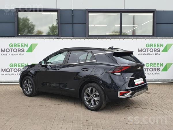 Black Kia Sportage 2022 in Riga, with an engine capacity of 1.60 L and mileage of 82 thousand km for 22900 €, photo 6 on AUTOMOTO.COM.LV