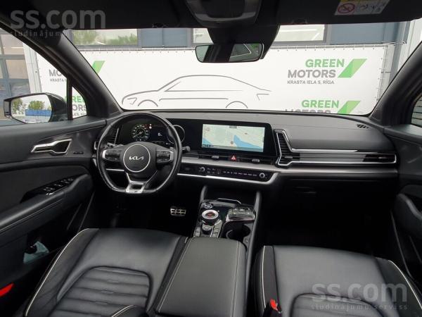 Black Kia Sportage 2022 in Riga, with an engine capacity of 1.60 L and mileage of 82 thousand km for 22900 €, photo 8 on AUTOMOTO.COM.LV