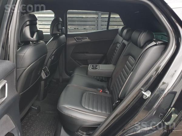 Black Kia Sportage 2022 in Riga, with an engine capacity of 1.60 L and mileage of 82 thousand km for 22900 €, photo 10 on AUTOMOTO.COM.LV