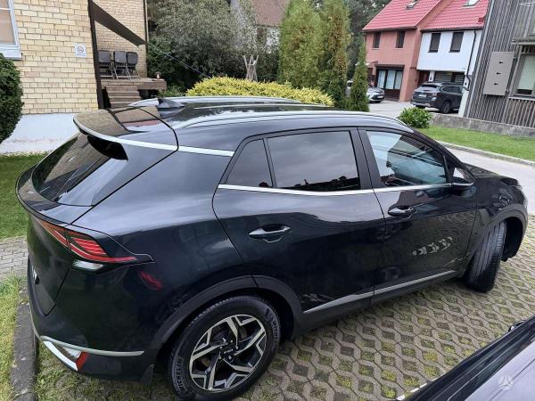 Black Kia Sportage 2022 in Klaipeda, with an engine capacity of 1.60 L and mileage of 89 thousand km for 20900 €, photo 7 on AUTOMOTO.COM.LV