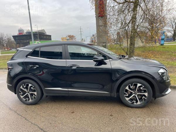 Black Kia Sportage 2023 in Riga, with an engine capacity of 1.60 L and mileage of 78 thousand km for 24200 €, photo 6 on AUTOMOTO.COM.LV