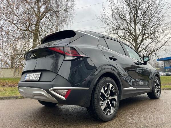 Black Kia Sportage 2023 in Riga, with an engine capacity of 1.60 L and mileage of 78 thousand km for 24200 €, photo 9 on AUTOMOTO.COM.LV