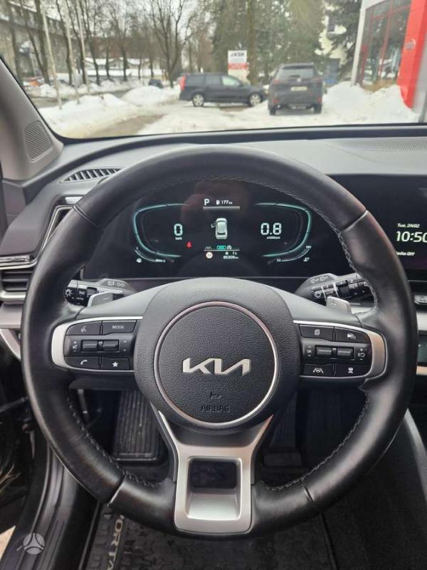 Black Kia Sportage 2023 in Klaipeda, with an engine capacity of 1.60 L and mileage of 85 thousand km for 25500 €, photo 6 on AUTOMOTO.COM.LV