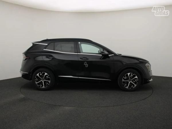 Black Kia Sportage 2023 in Vilnius, with an engine capacity of 1.60 L and mileage of 161 thousand km for 23999 €, photo 9 on AUTOMOTO.COM.LV