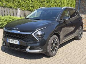 Black Kia Sportage 2023 in Kaunas, with an engine capacity of 1.60 L and mileage of 140 thousand km for 23200 €, photo  on AUTOMOTO.COM.LV