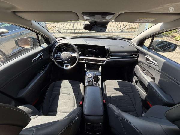 Black Kia Sportage 2023 in Kaunas, with an engine capacity of 1.60 L and mileage of 140 thousand km for 23200 €, photo 5 on AUTOMOTO.COM.LV