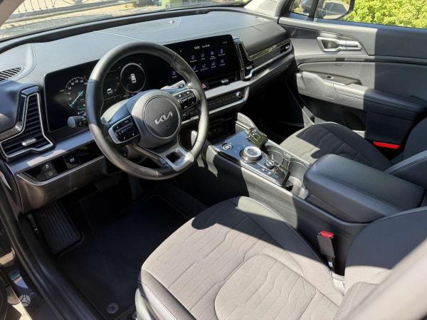 Black Kia Sportage 2023 in Kaunas, with an engine capacity of 1.60 L and mileage of 140 thousand km for 23200 €, photo 6 on AUTOMOTO.COM.LV