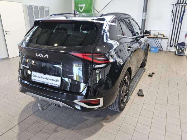 Black Kia Sportage 2023 in Vilnius, with an engine capacity of 1.60 L and mileage of 61 thousand km for 32222 €, photo 2 on AUTOMOTO.COM.LV