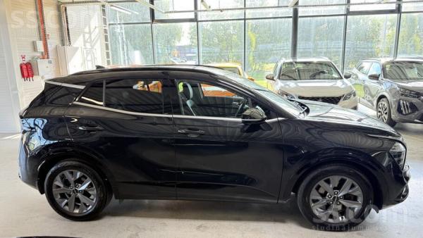 Black Kia Sportage 2024 in Riga, with an engine capacity of 1.60 L and mileage of 47 thousand km for 28900 €, photo 5 on AUTOMOTO.COM.LV