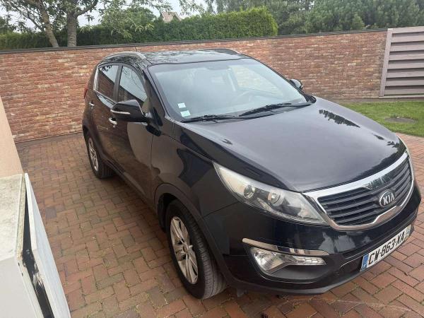 Melns Kia Sportage 2013 Tauragė, ar dzinēja tilpumu 1.70 L un nobraukumu 263 tūkst. km par 5600 €, foto 3 vietnē AUTOMOTO.COM.LV