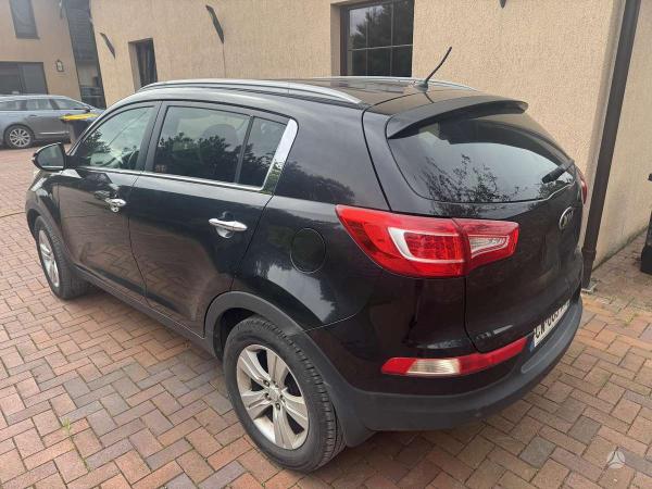 Melns Kia Sportage 2013 Tauragė, ar dzinēja tilpumu 1.70 L un nobraukumu 263 tūkst. km par 5600 €, foto 4 vietnē AUTOMOTO.COM.LV