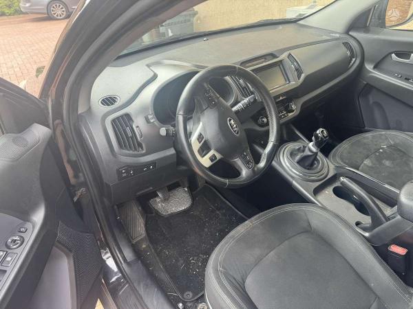 Melns Kia Sportage 2013 Tauragė, ar dzinēja tilpumu 1.70 L un nobraukumu 263 tūkst. km par 5600 €, foto 6 vietnē AUTOMOTO.COM.LV