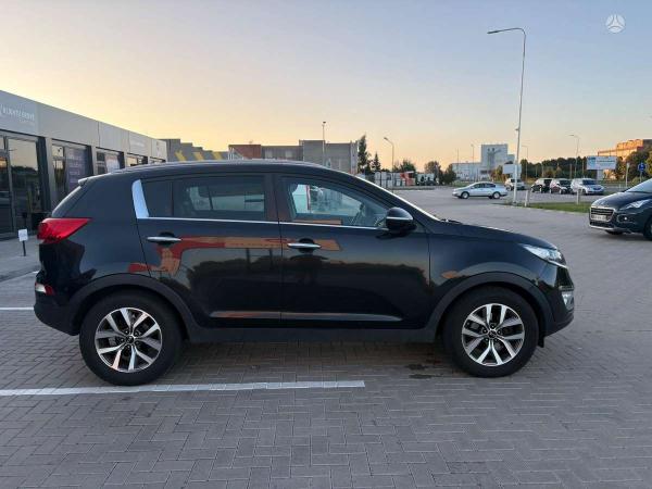 Melns Kia Sportage 2015 Tauragė, ar dzinēja tilpumu 1.69 L un nobraukumu 271 tūkst. km par 6700 €, foto 4 vietnē AUTOMOTO.COM.LV